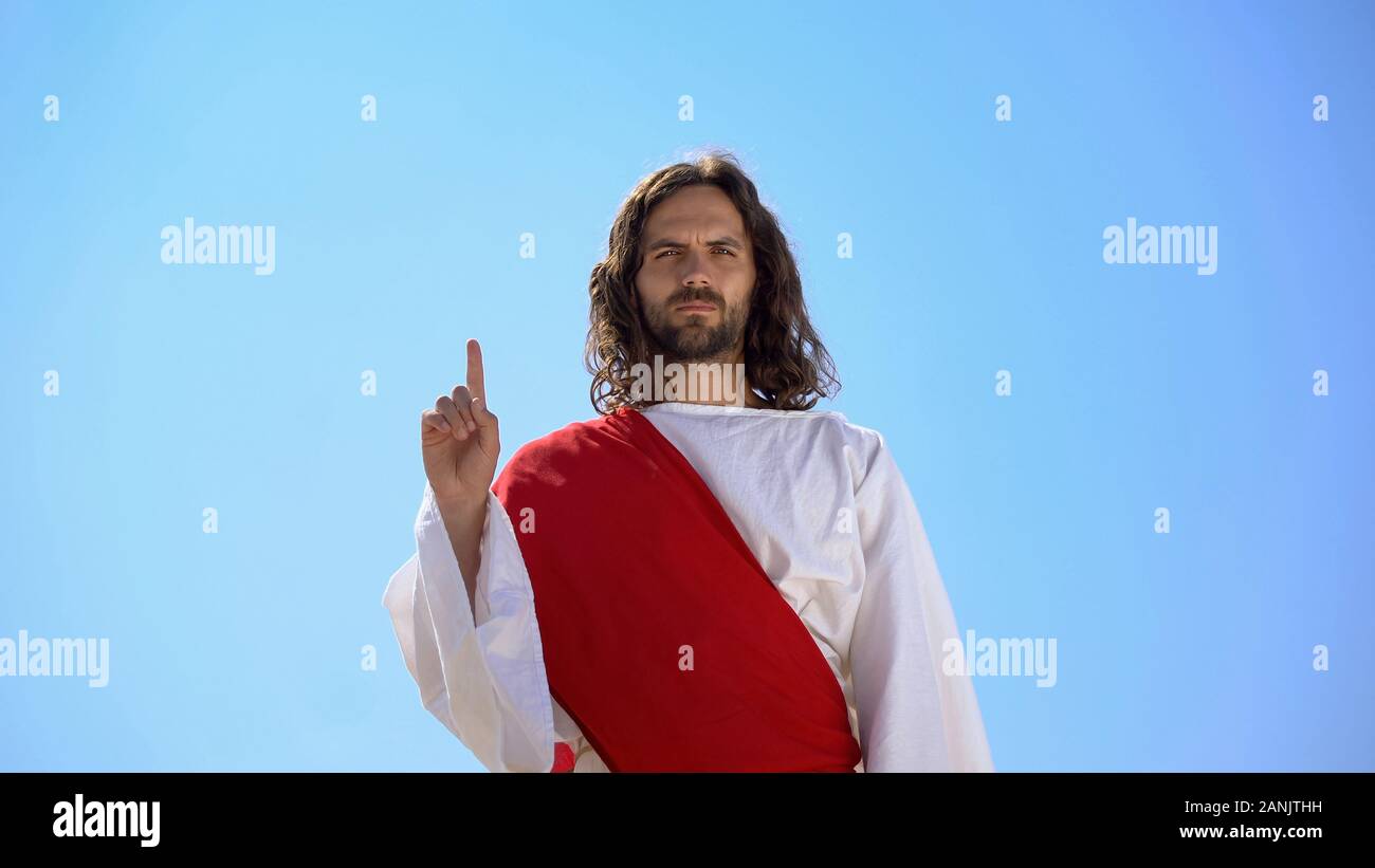 Strict God pointing finger up, attention to righteous life, avoid ...