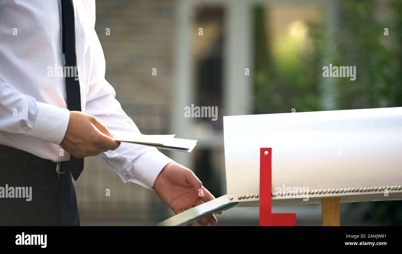 Businessman sending receiving letters hi-res stock photography and ...