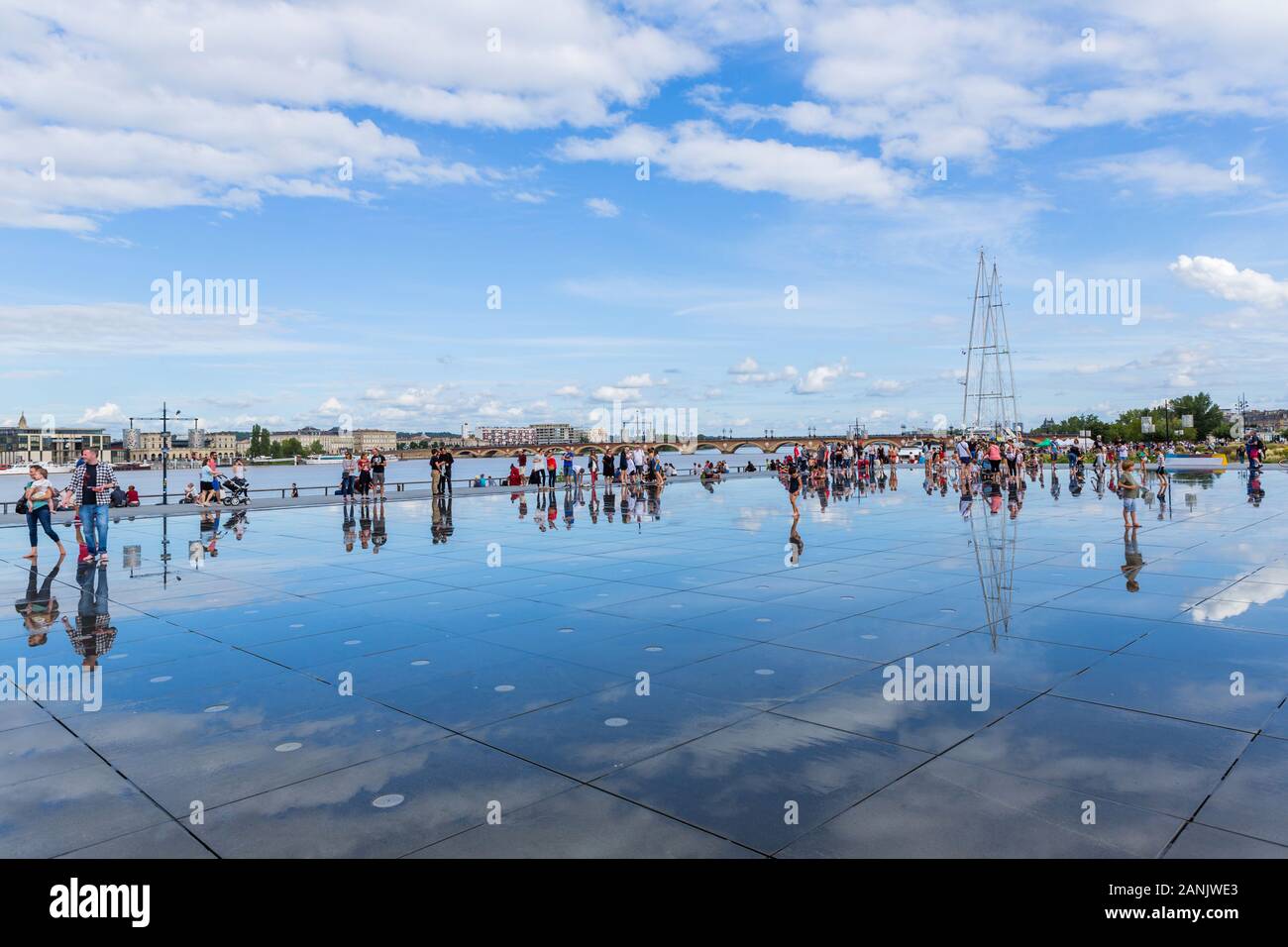 Famous Bordeaux water mirror full of people Stock Photo - Alamy