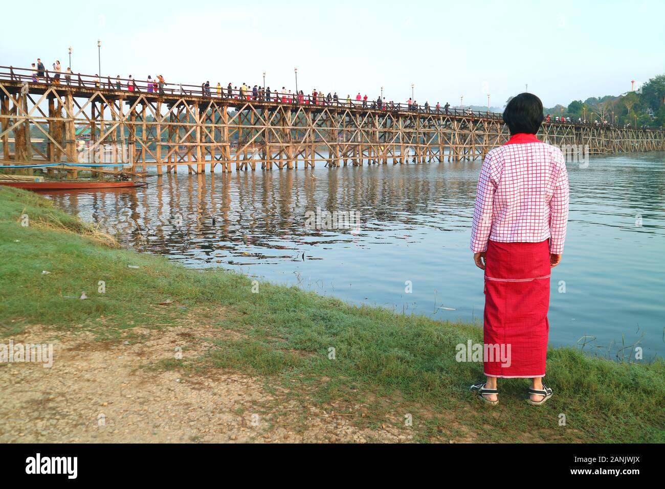 Young Man in Traditional Mon Clothing Looking at the Iconic Mon Bridge ...