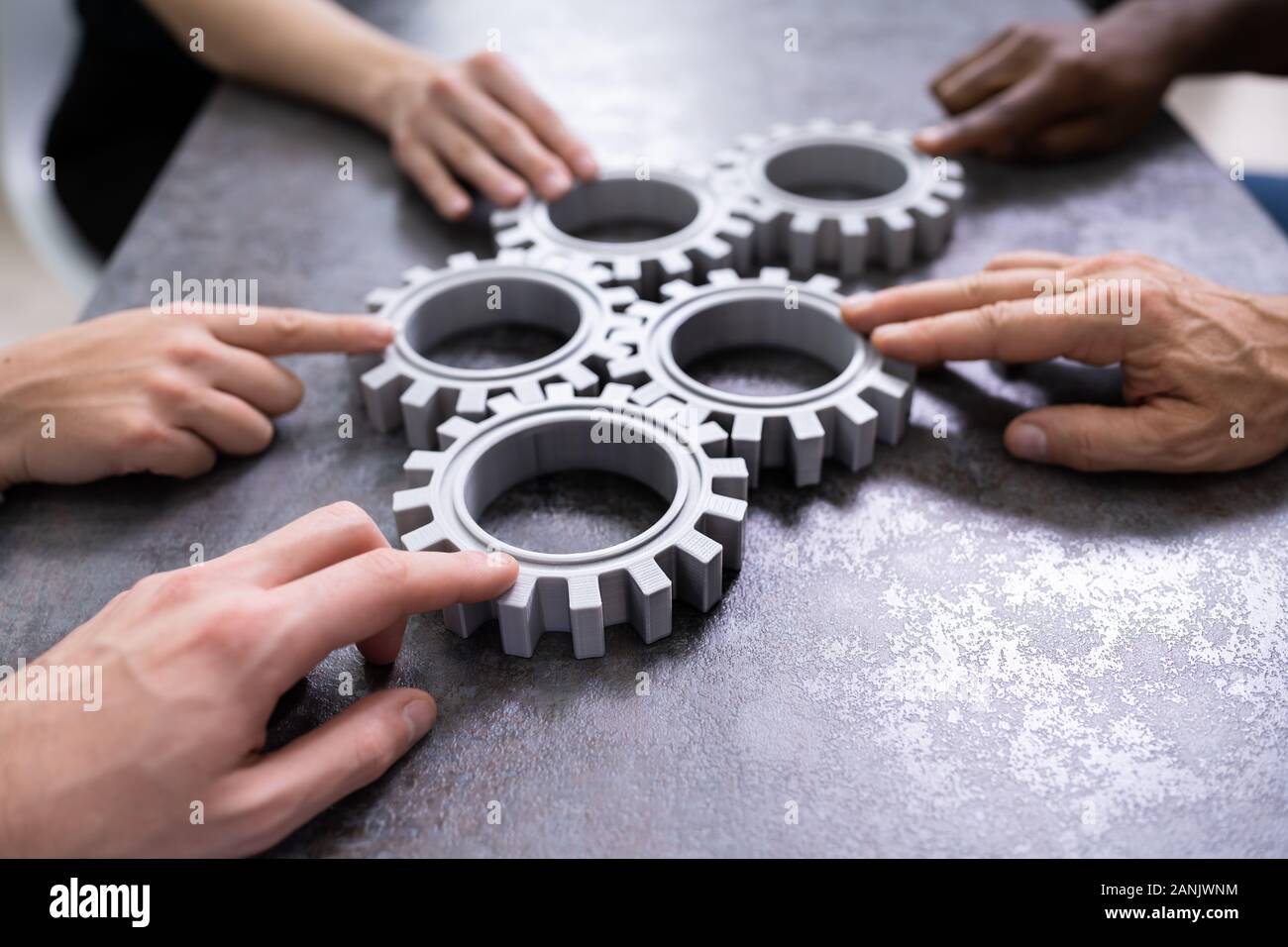 Business people teamwork gear together hi-res stock photography and ...