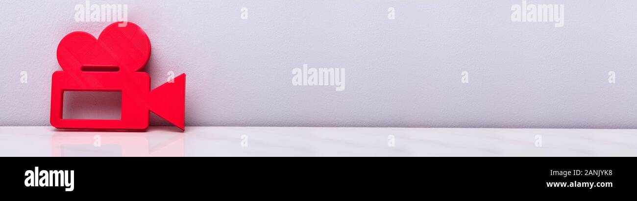 3D Video Camera Sign Leaning Against White Background Stock Photo - Alamy