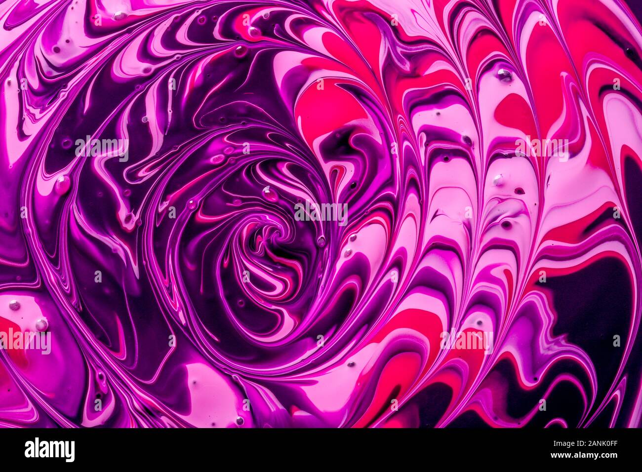 Abstract background illustration of pink, purple and black paint swirls ...