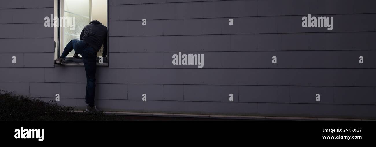 Climbing through window hi-res stock photography and images - Alamy