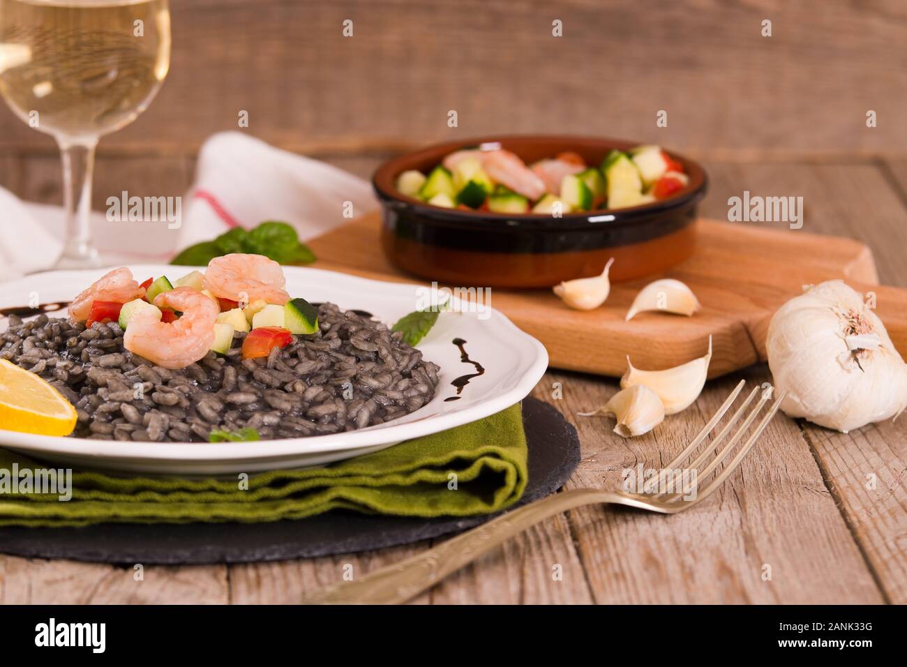 Squid ink risotto Stock Photo - Alamy