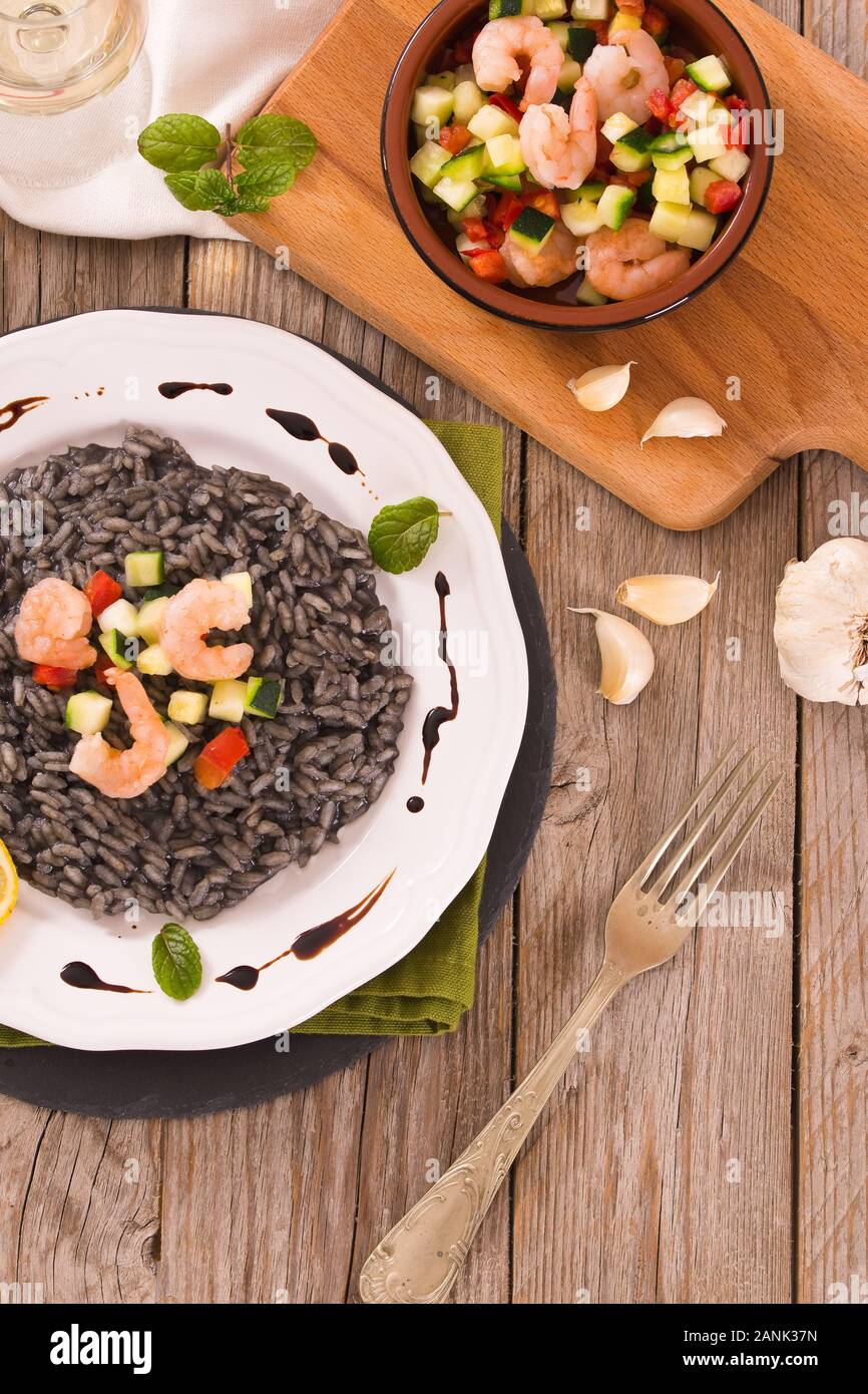 Squid ink risotto Stock Photo - Alamy