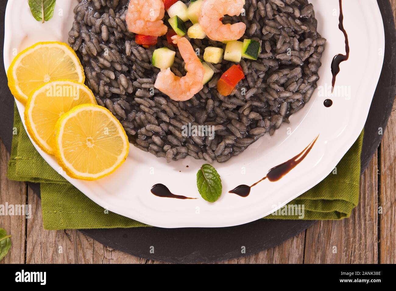Squid ink risotto Stock Photo - Alamy