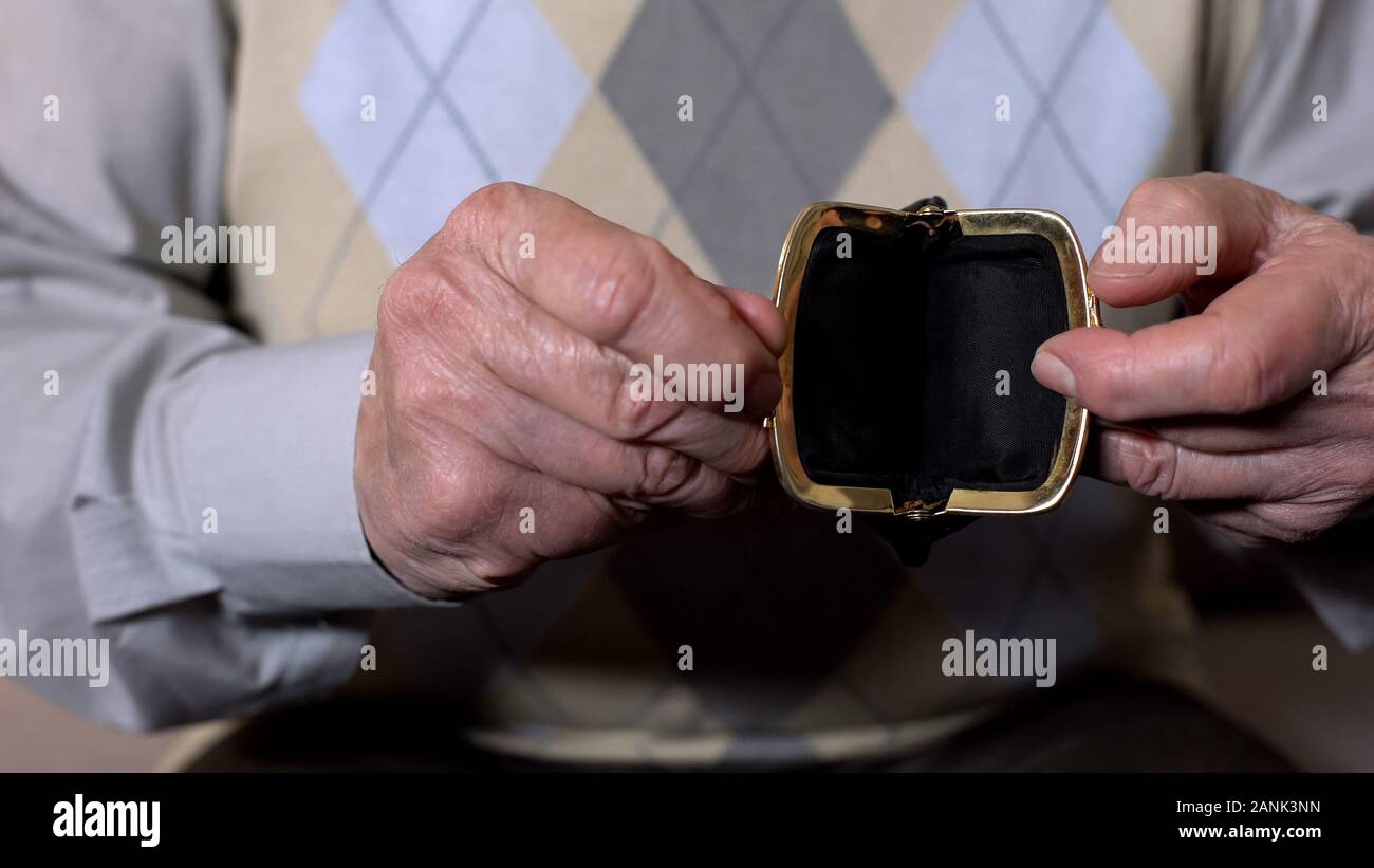 Empty purse pensioner hi-res stock photography and images - Alamy