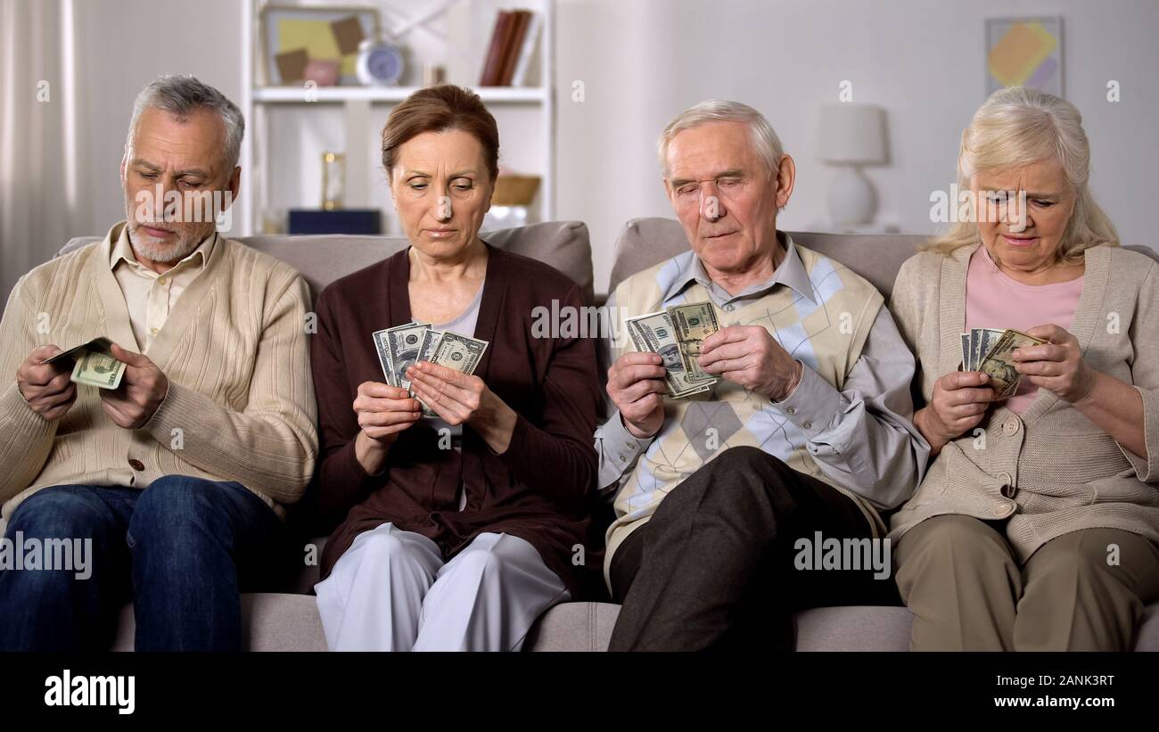 Poor aged couples counting dollars at home, lack of money, social ...