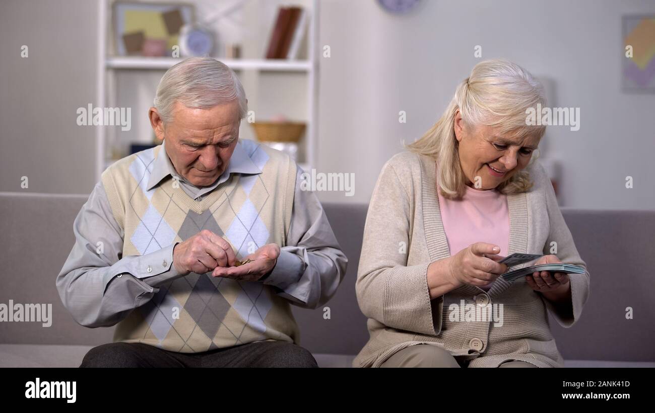 Poor woman counting money hi-res stock photography and images - Alamy