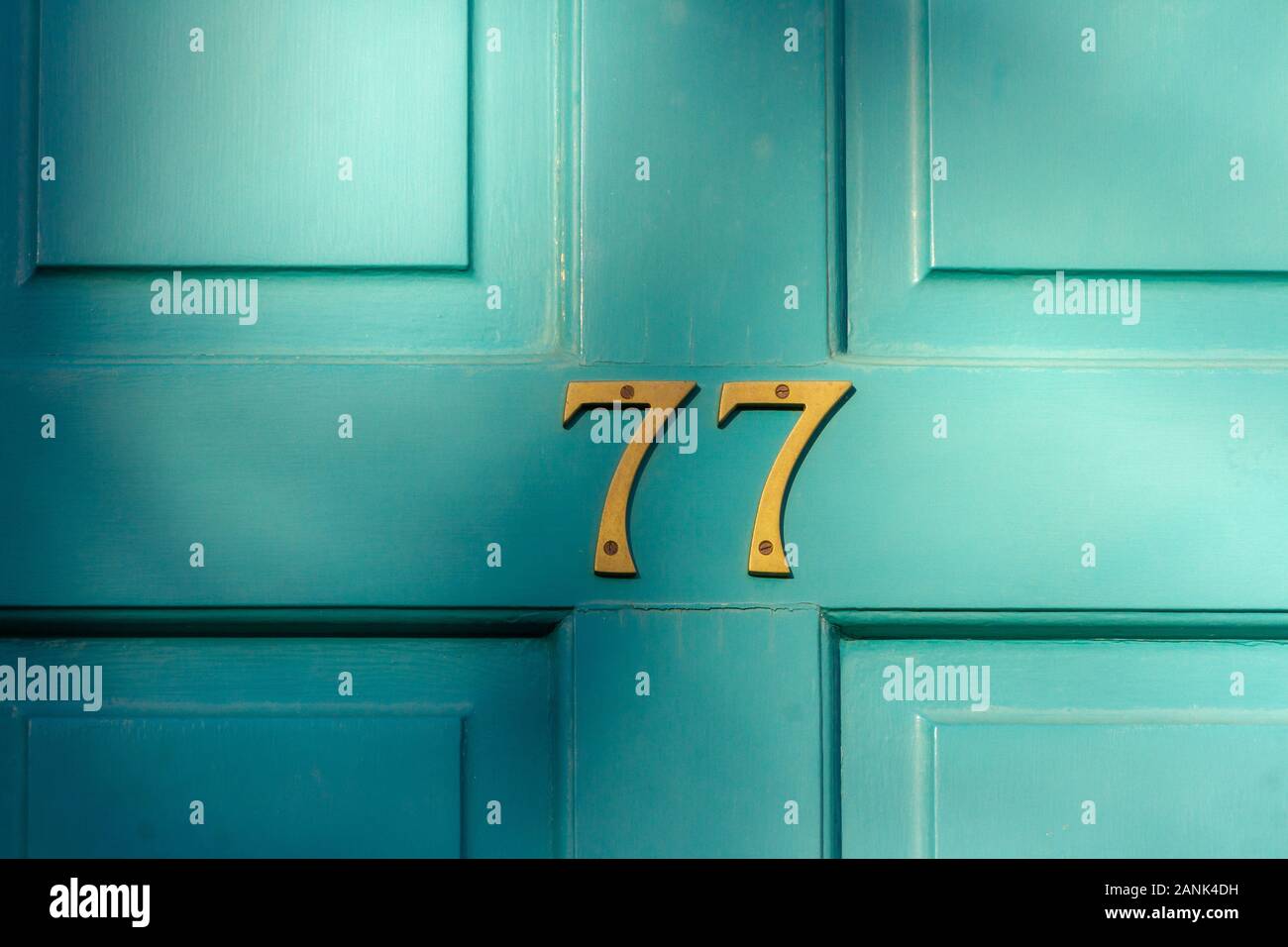 House number 77 Stock Photo - Alamy