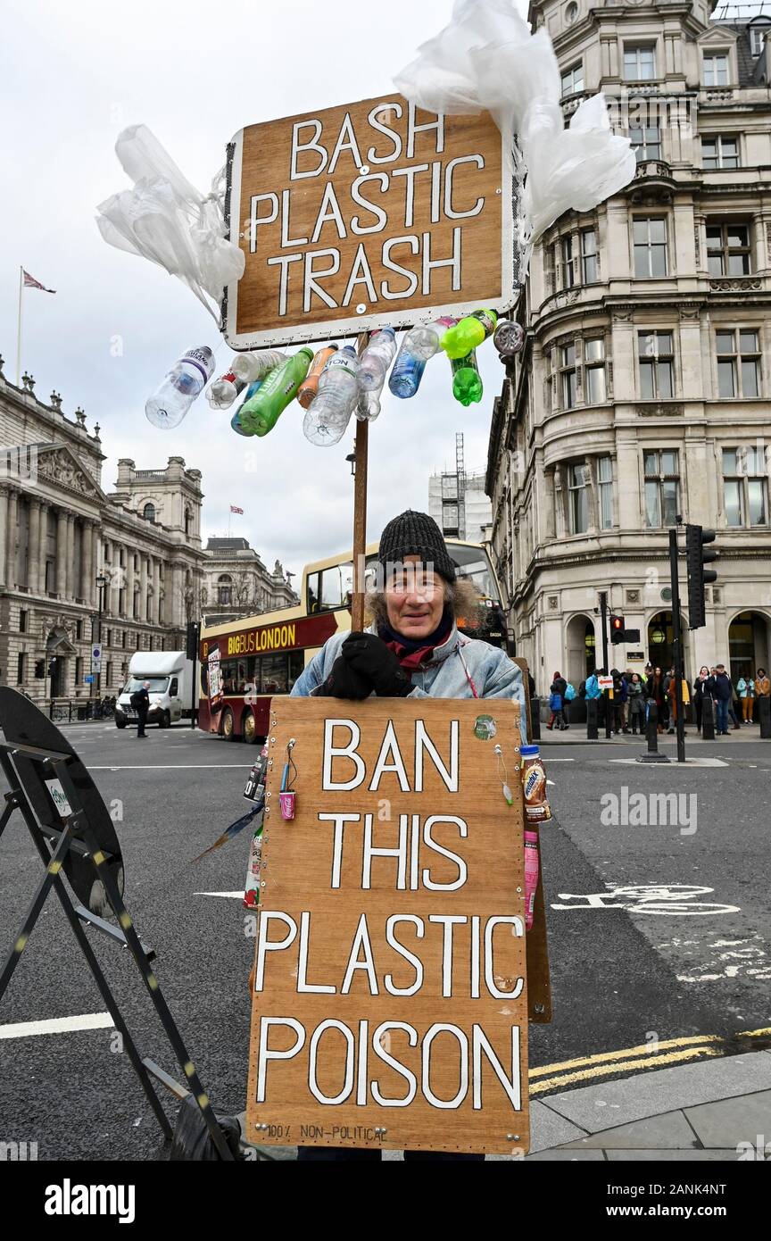 An environmental activist campaigning against plastic pollution with ...