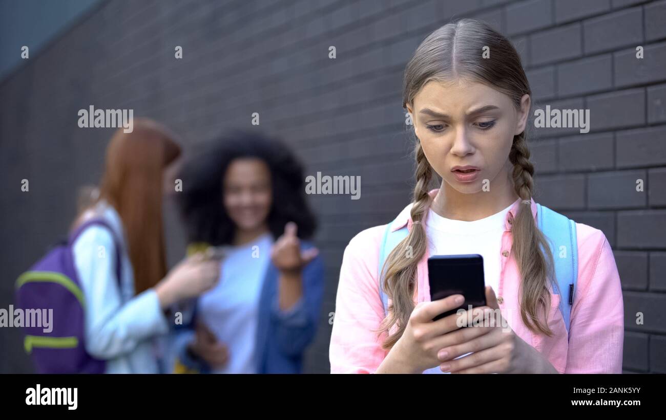 Embarrassed teenager friends hi-res stock photography and images - Alamy