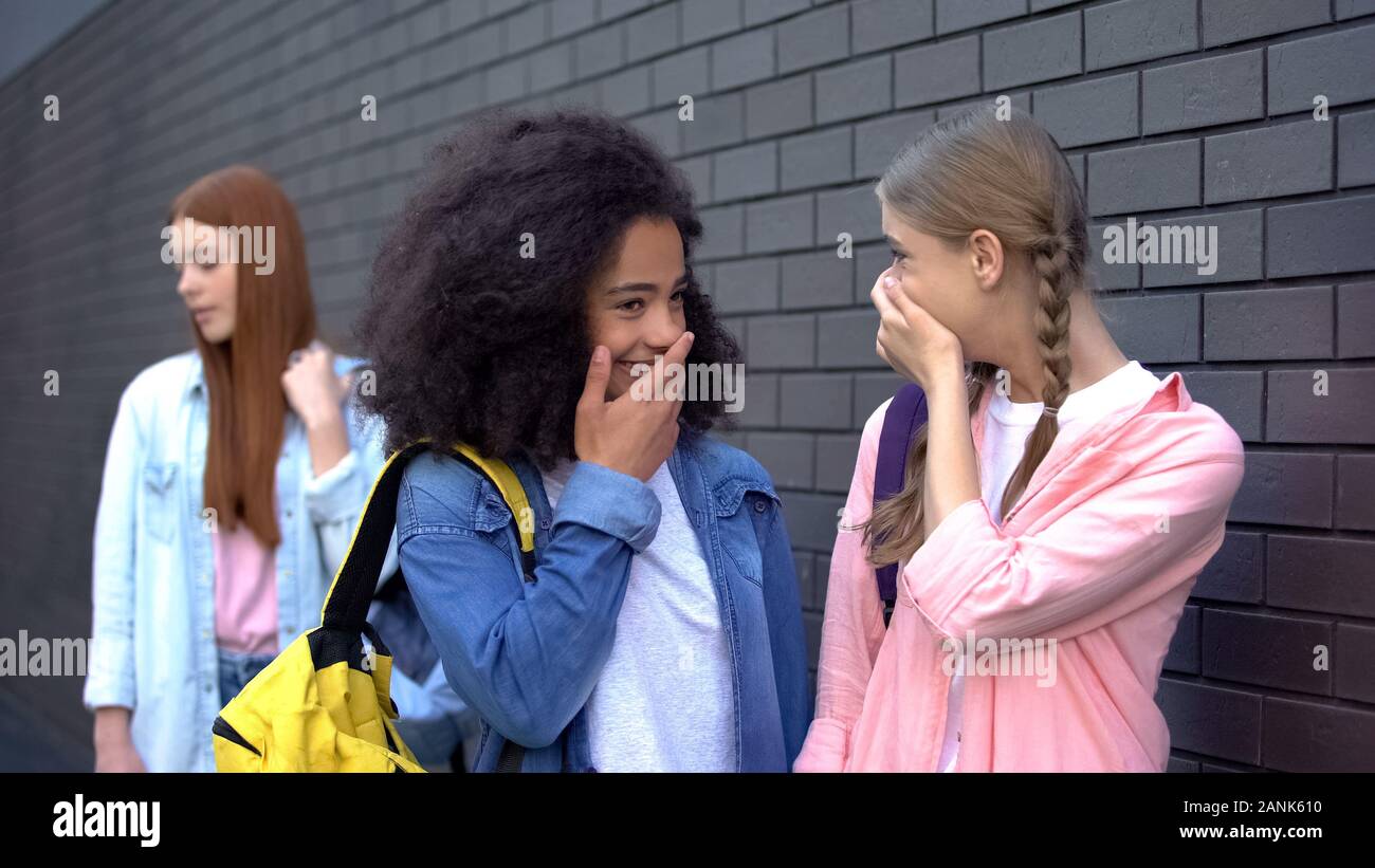 Female friends laughing at new classmate, college rejection, lack ...