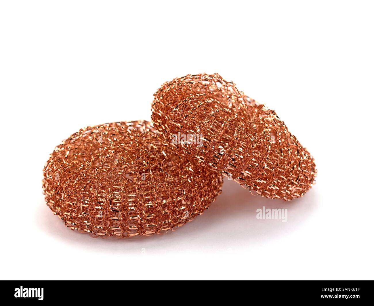 Copper scourer against white background Stock Photo - Alamy