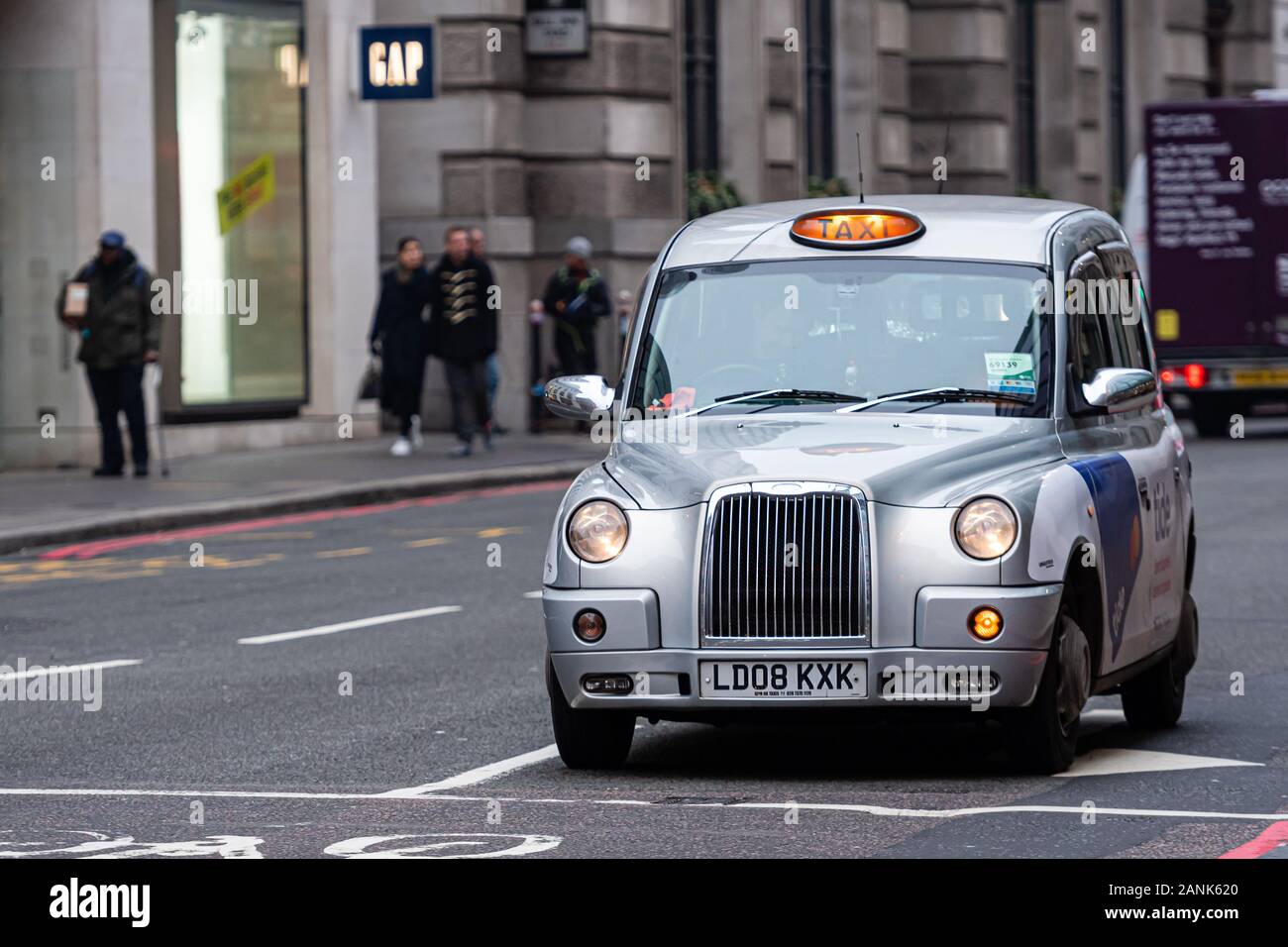 London, England, UK - December 31, 2019: Typical black London cab in ...