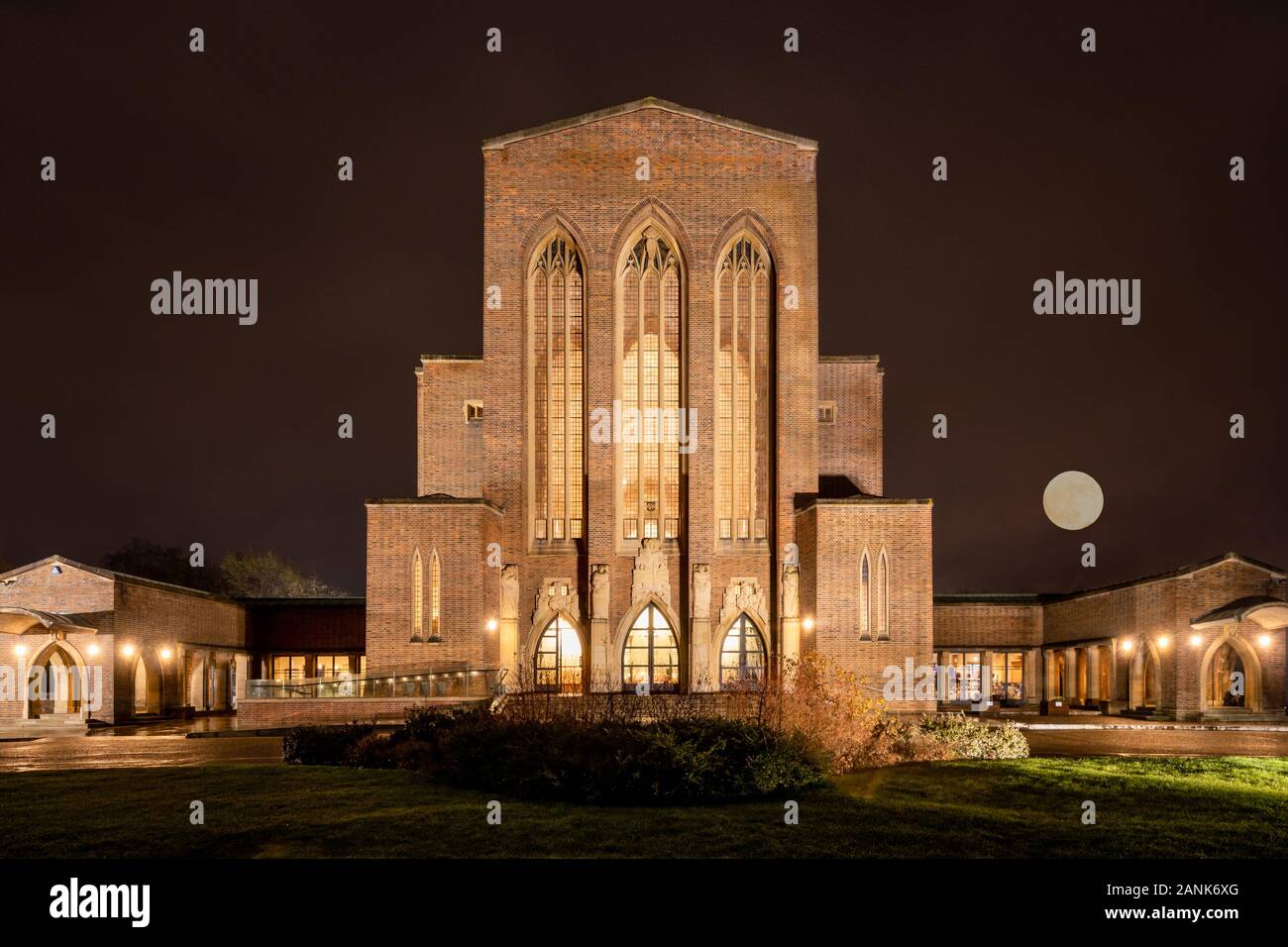 Guildford Cathedral at night with a full moon, Surrey, UK Stock Photo ...