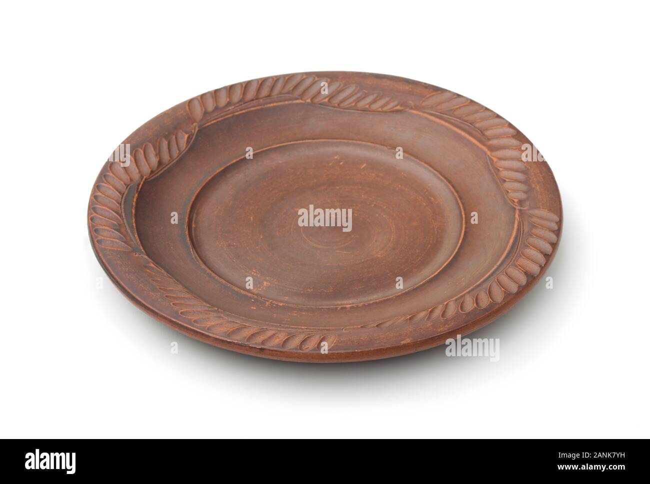 Empty old clay plate isolated on white Stock Photo - Alamy