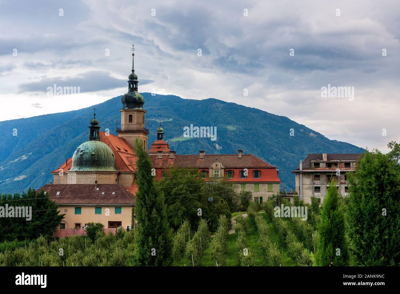 Old monastery with apple trees garden. Tirol, South Tyrol Stock Photo ...