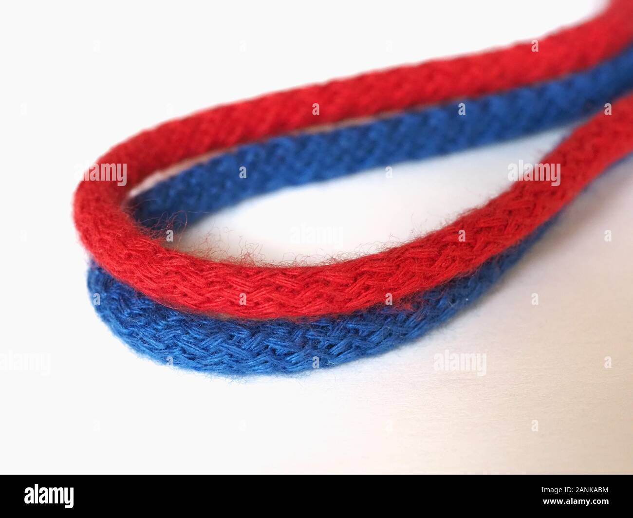 red and blue rope over off white background Stock Photo - Alamy