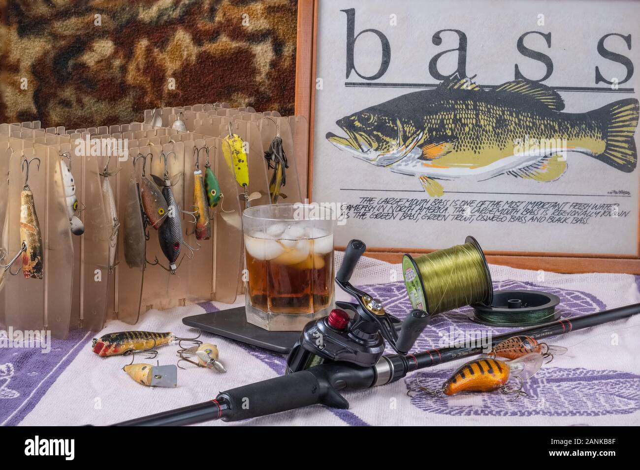 Still life of fishing rod reel line and lures for black bass ...