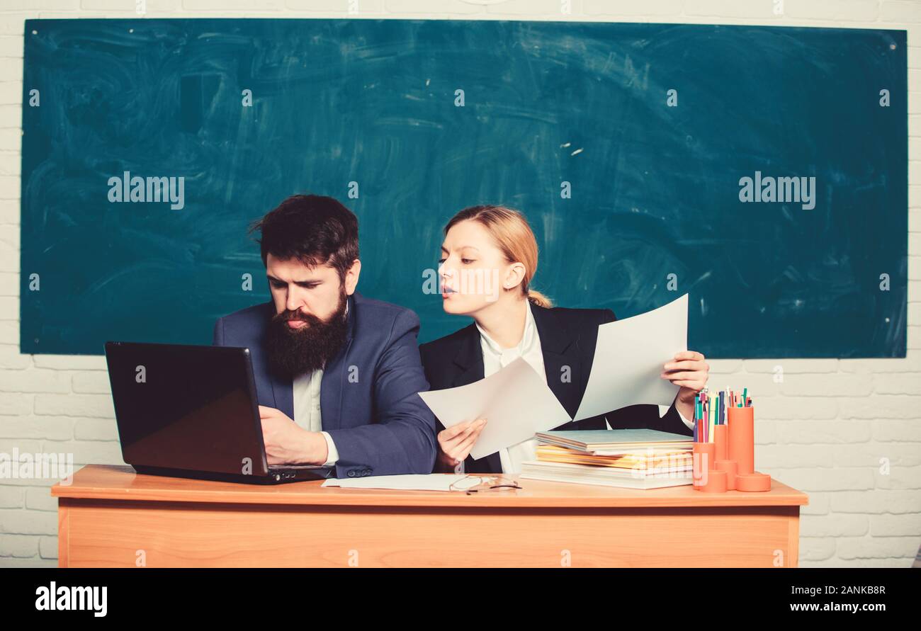 Teacher and supervisor working together in school classroom. School ...