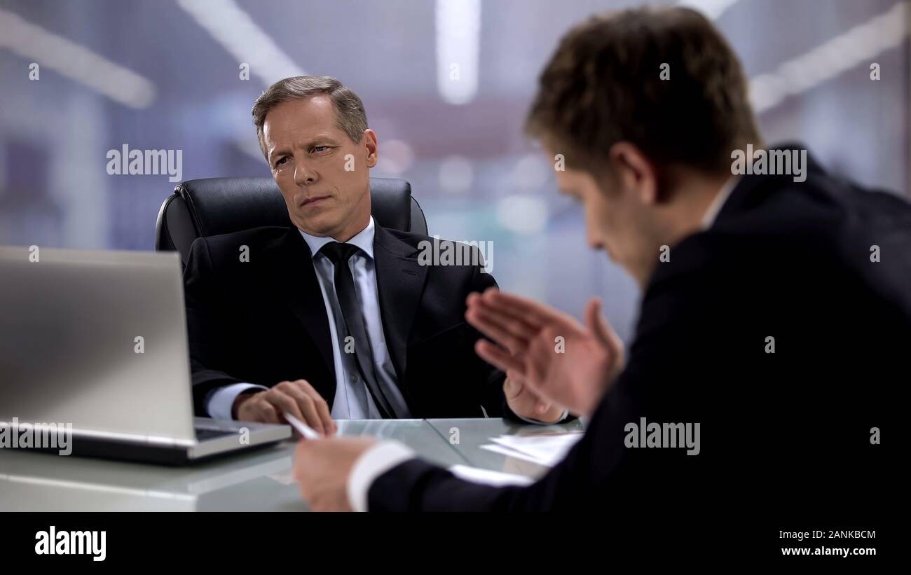 Worker talking to employer hi-res stock photography and images - Alamy