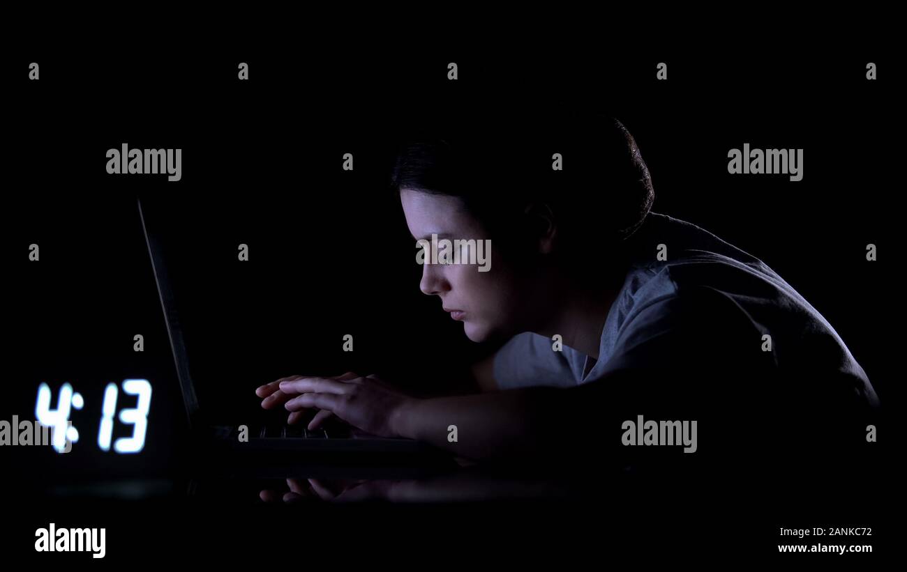 Exhausted woman falling asleep while working on computer, self-occupied ...