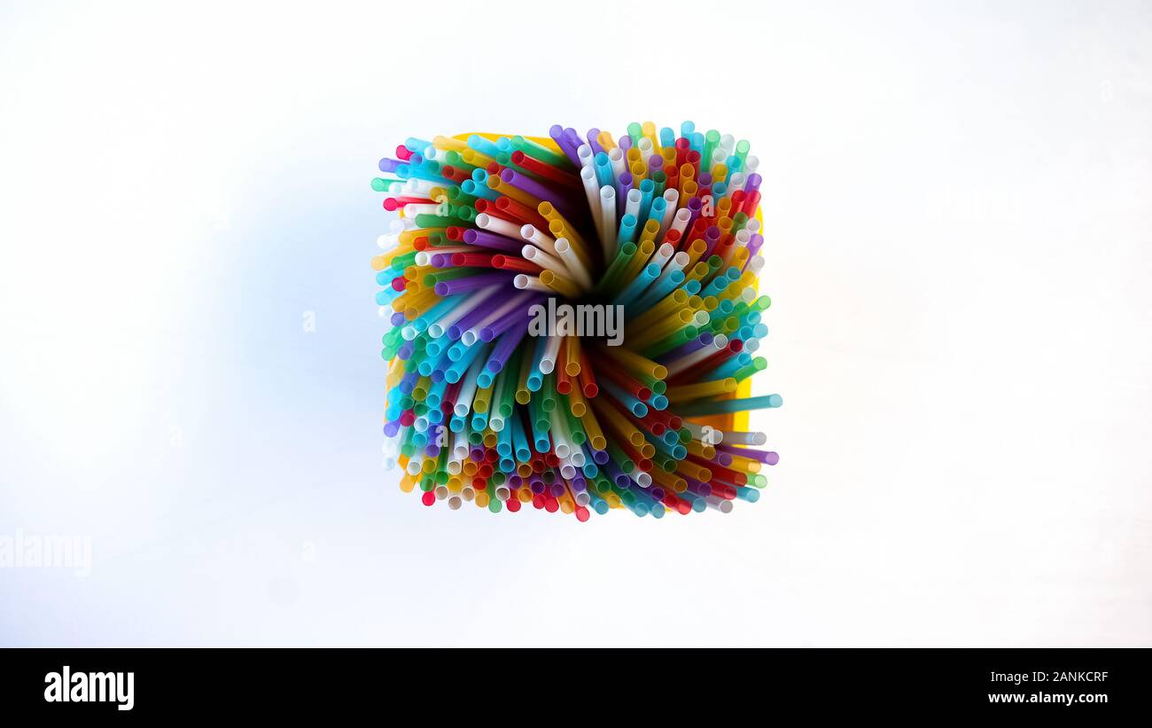 Plastic straws standing in pencil box, creativity and art, recycling ...