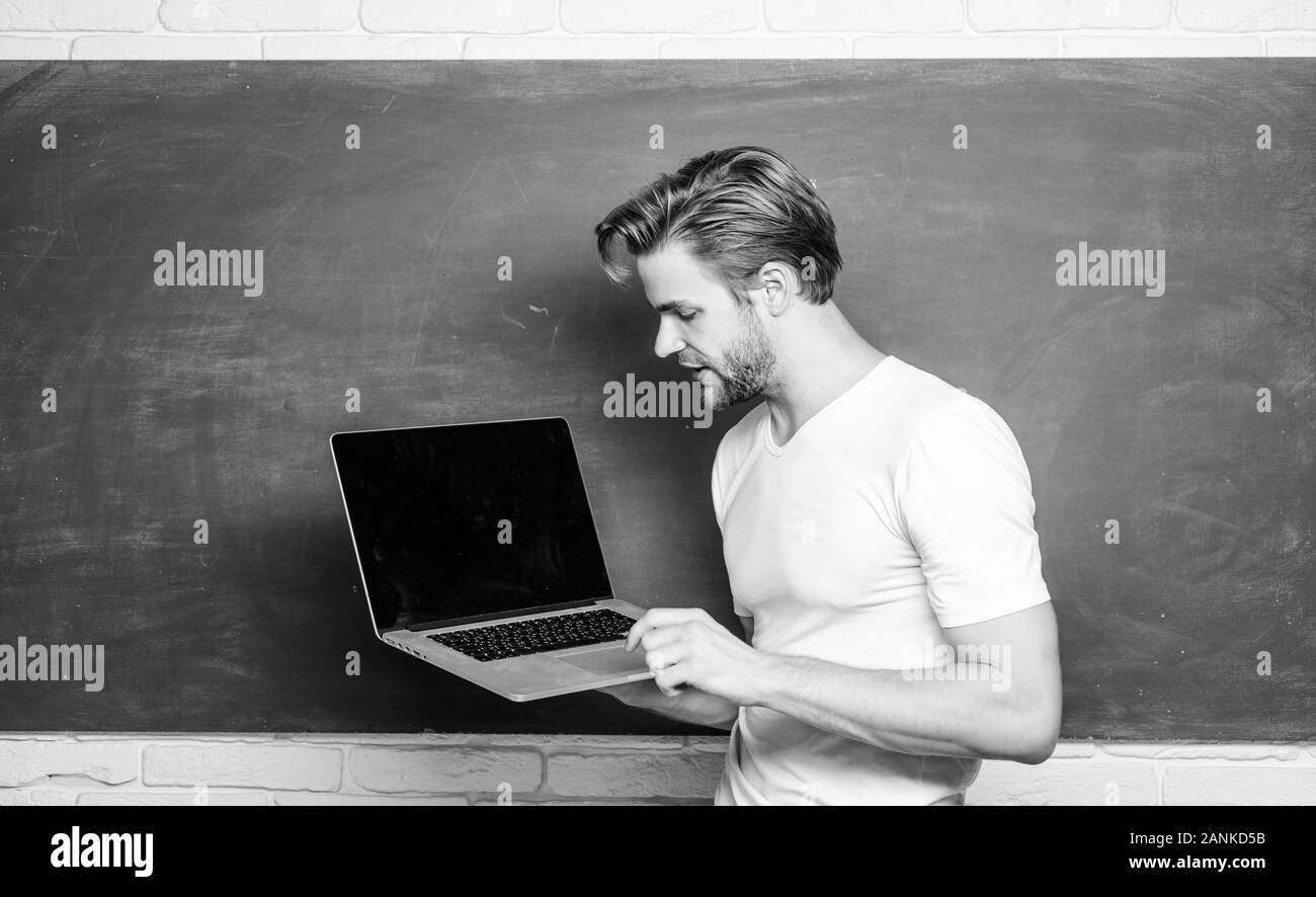 Programming web development. School teacher programming with laptop ... Programming web development. School teacher programming with laptop ...