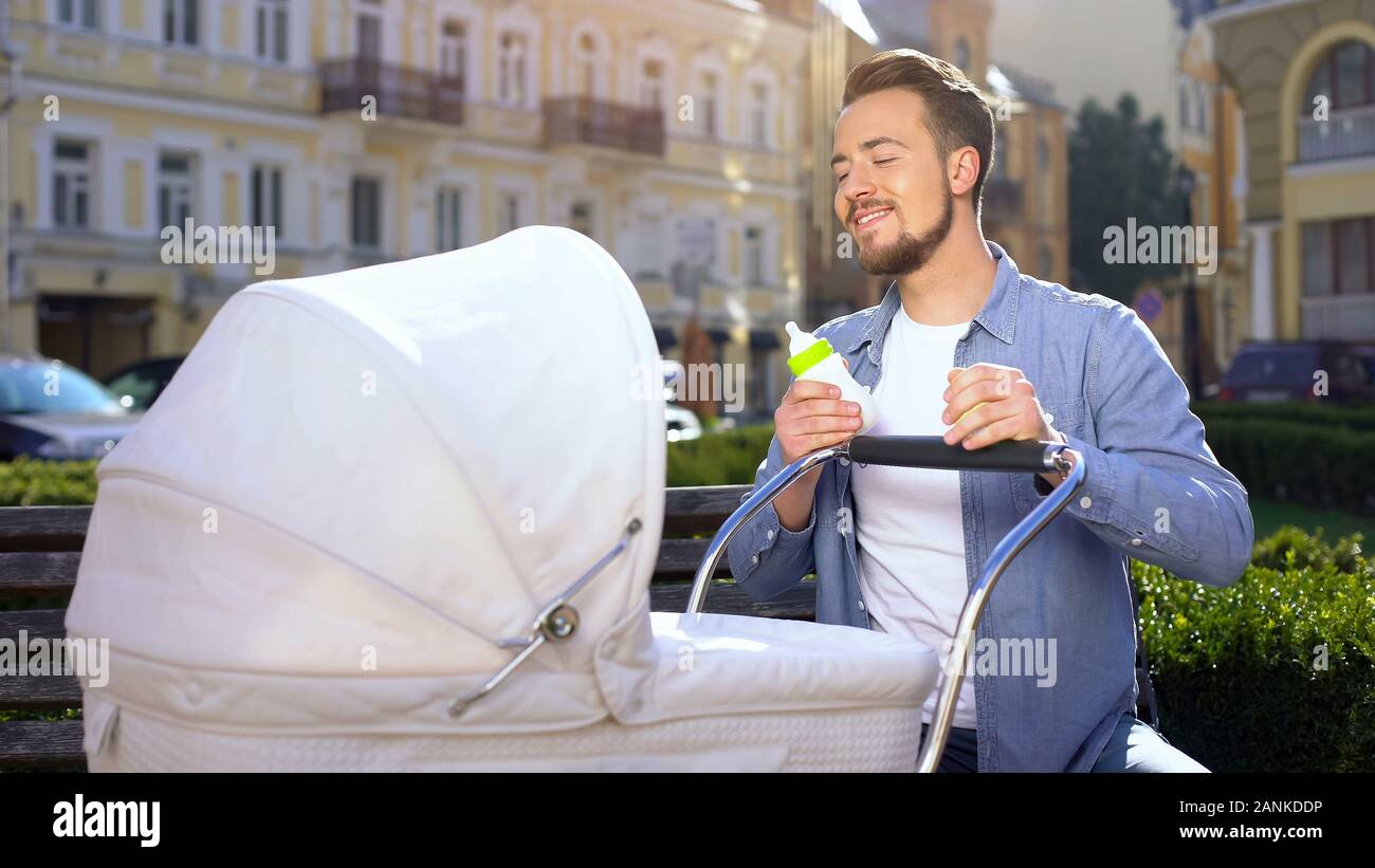 Dad pushing pram hi-res stock photography and images - Alamy