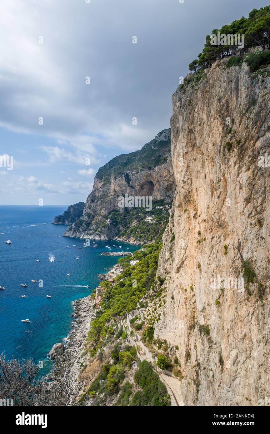 Vertical photo of rocks and cliffs of Capri island. Viewpoint to the ...
