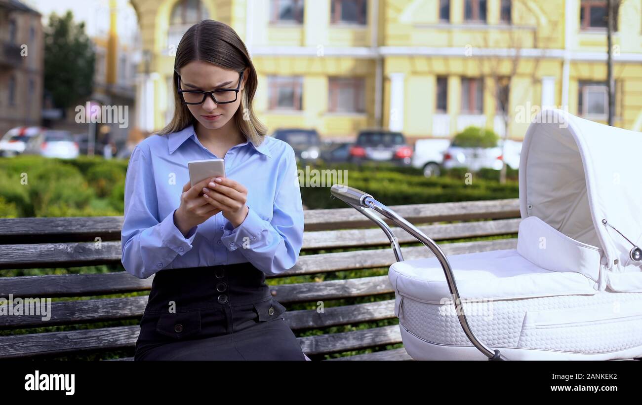 Woman Ignoring Baby High Resolution Stock Photography and Images - Alamy