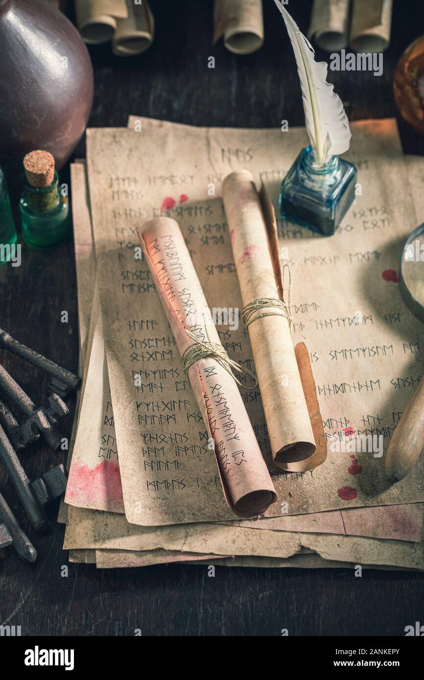 Magic scribe library full of medieval and old scrolls Stock Photo - Alamy