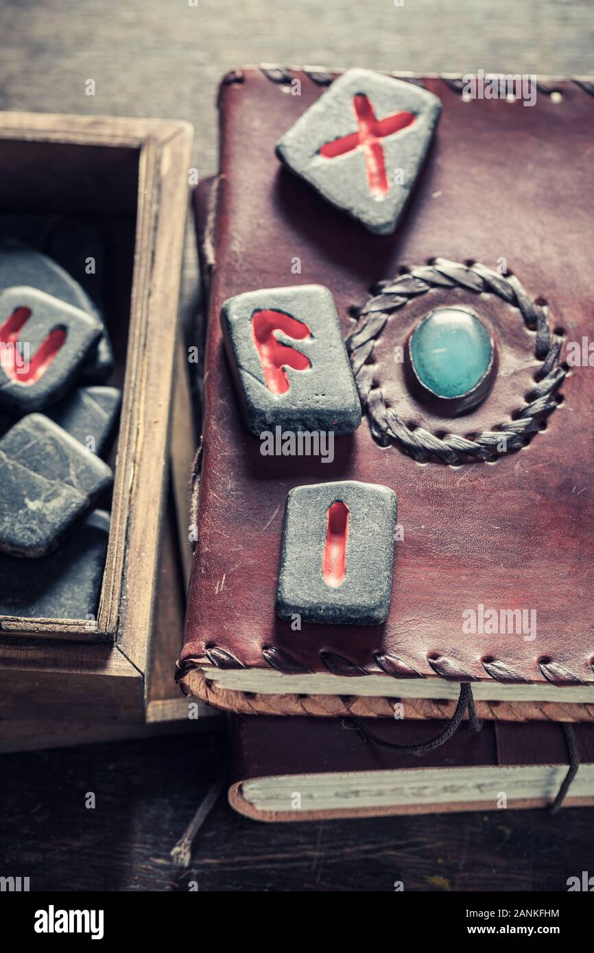 Unique runestones omen made of Celtic language Stock Photo - Alamy