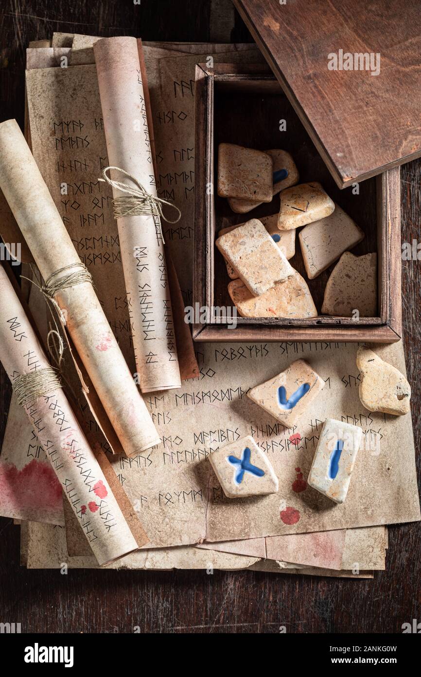 Old divination by rune cards and stones with old manuscript Stock Photo ...