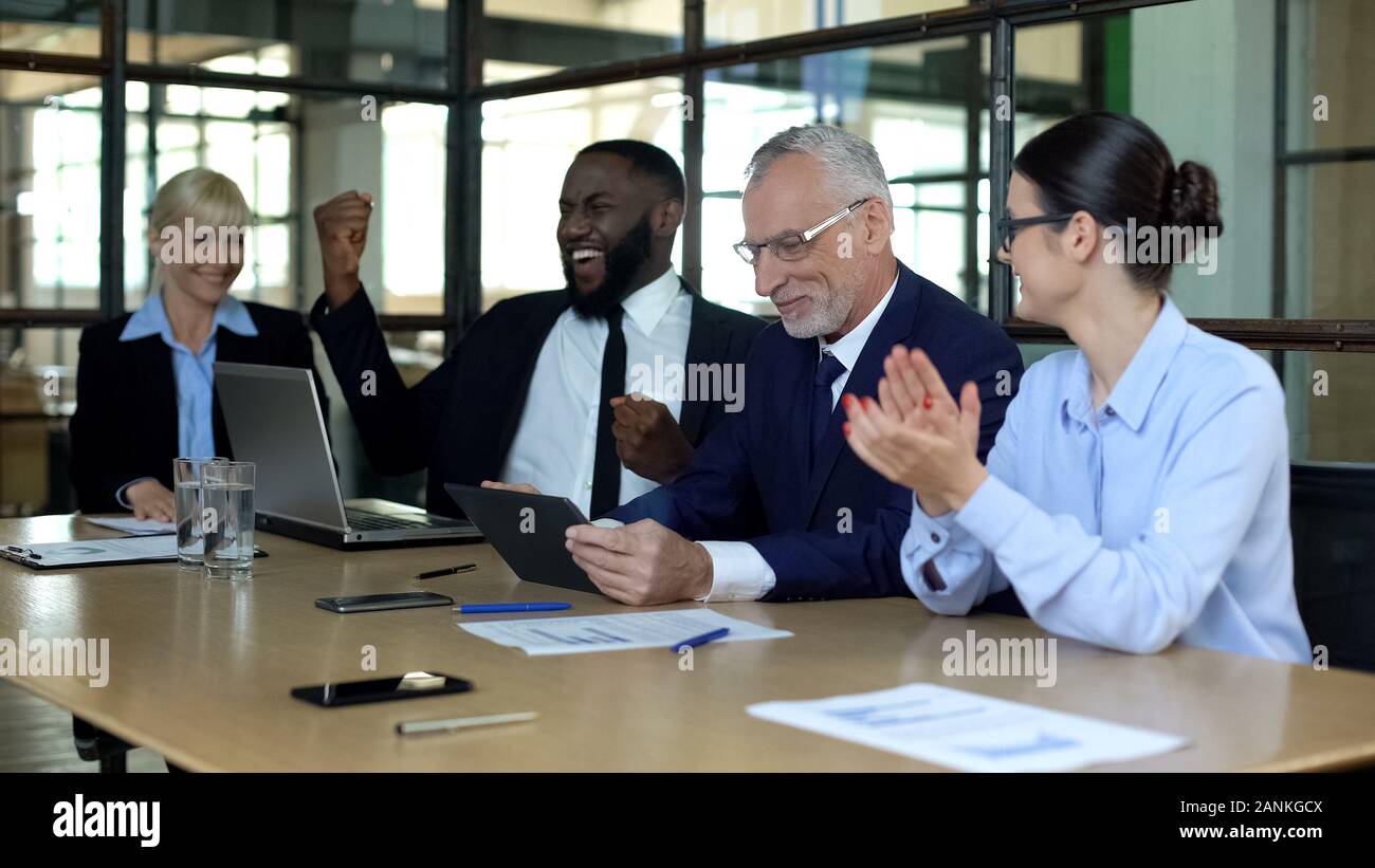 Office employees celebrating hi-res stock photography and images - Alamy