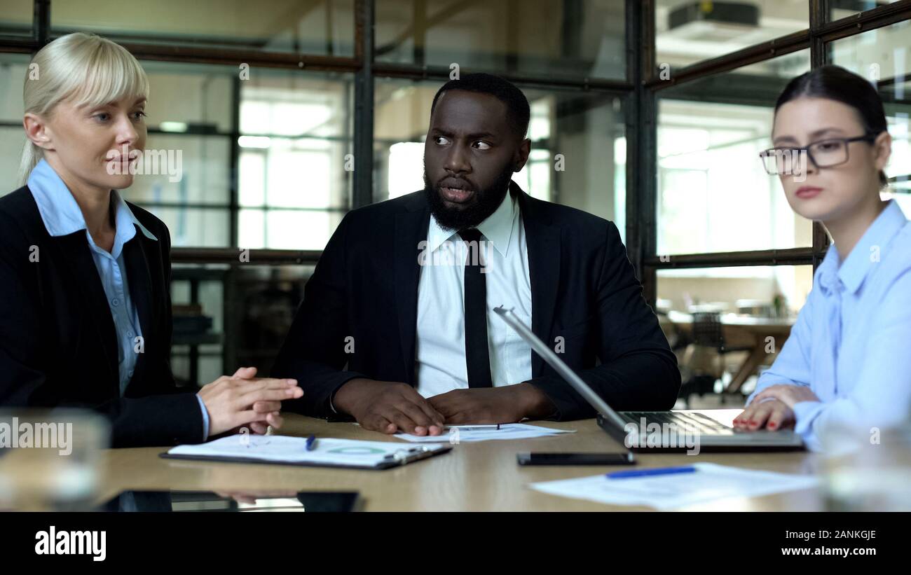 Male employee shocked by conflict between female colleagues, office ...