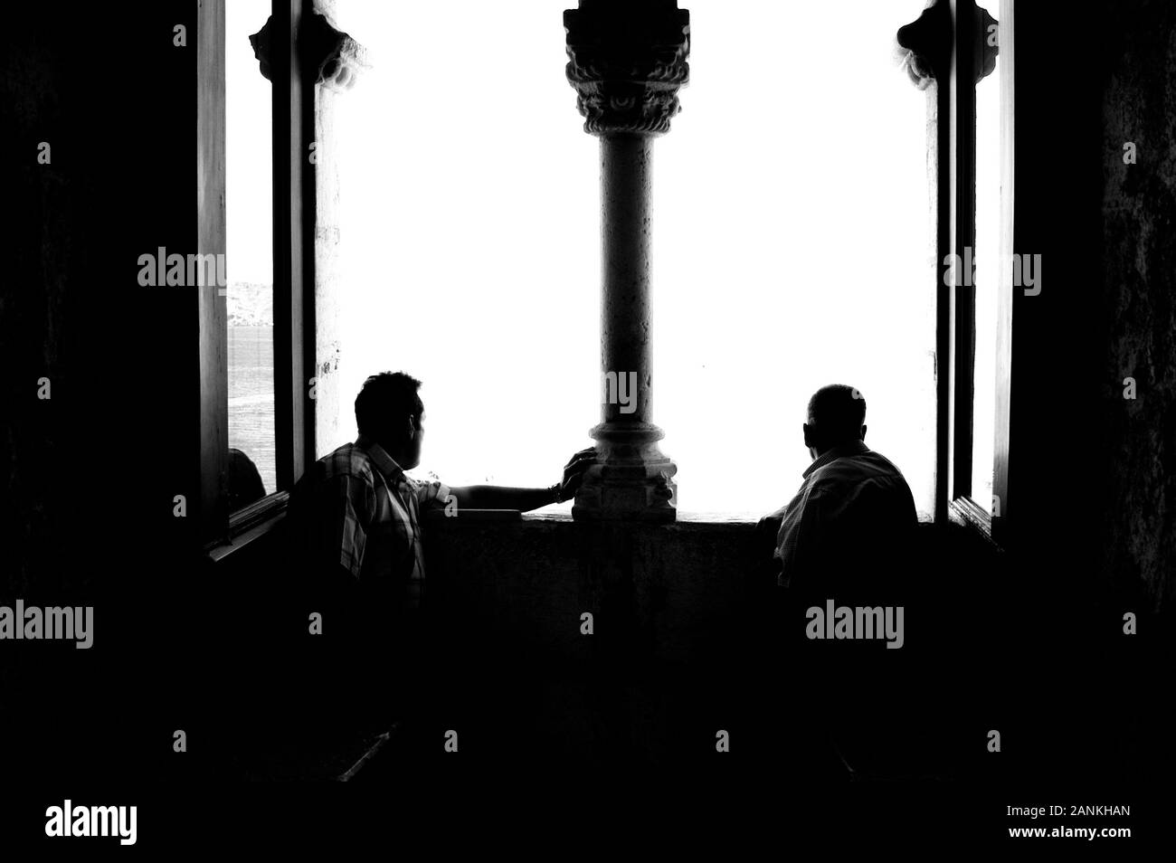 Two old people talking in portugal hi-res stock photography and images ...