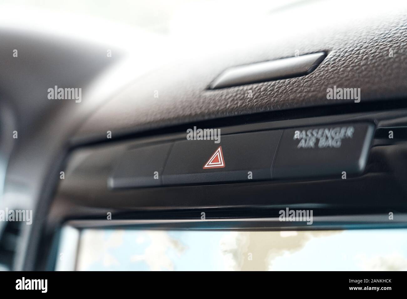 Red warning triangle sign in modern automobile Stock Photo - Alamy