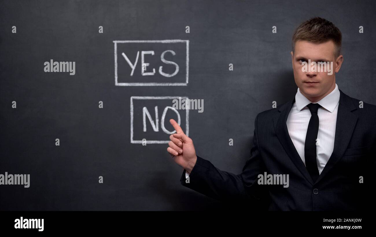 Man in suit pointing finger hi-res stock photography and images - Alamy