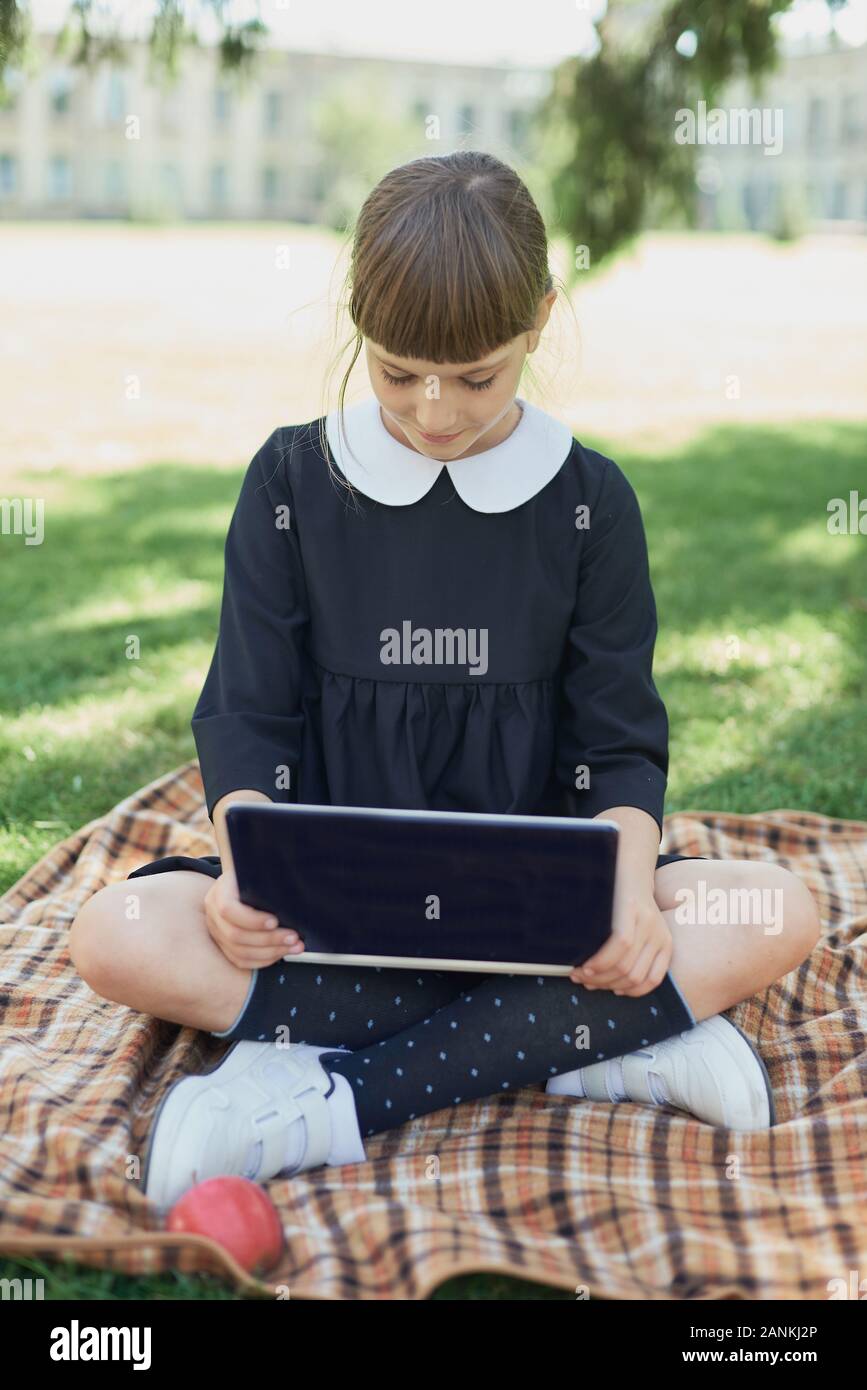 child with laptop computer. girl using pc. Life online. Surfing ...