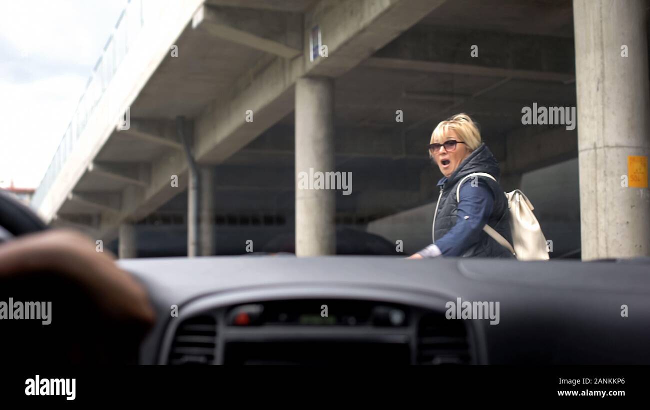 Woman running away danger hi-res stock photography and images - Alamy