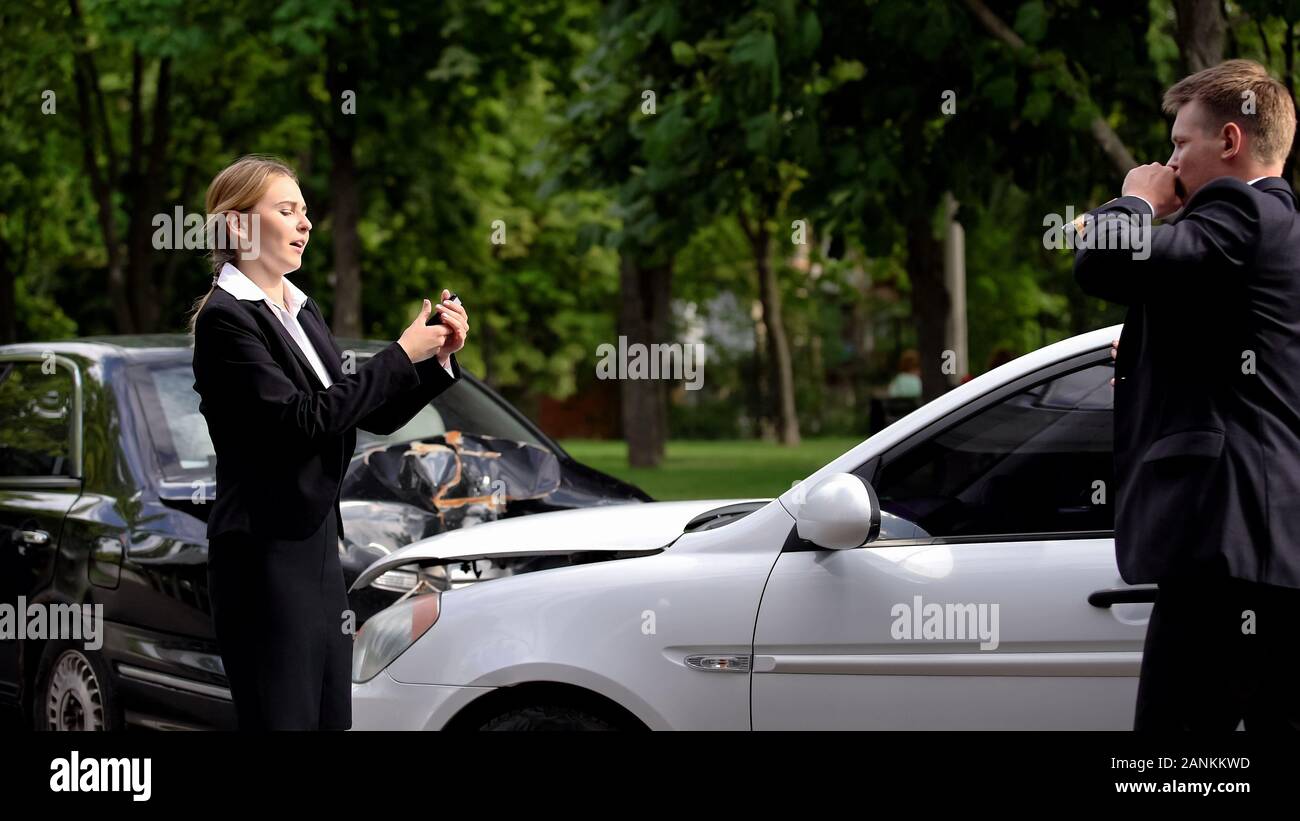 Lady calling police looking drunk male driver with beer bottle near ...