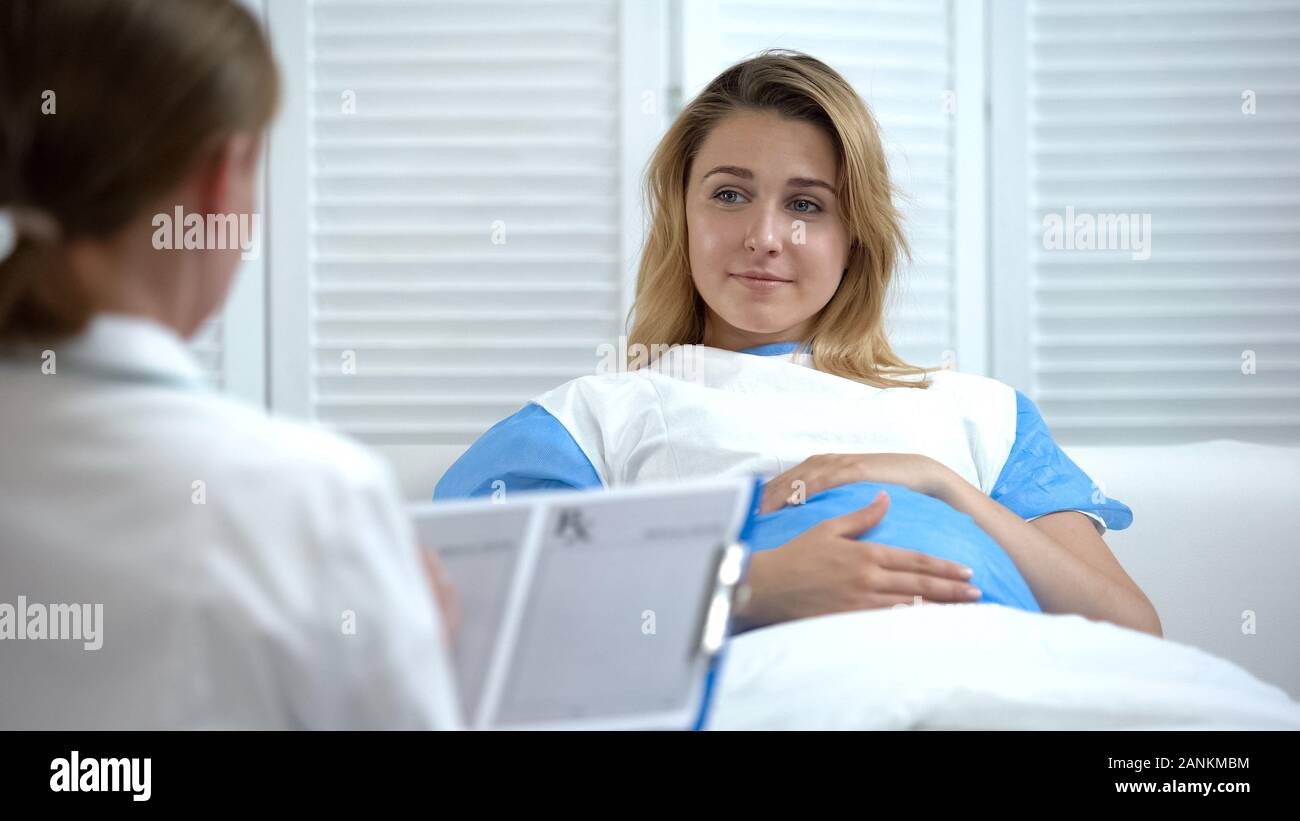 Pregnant female on clinical examination, prenatal care, maternity ...