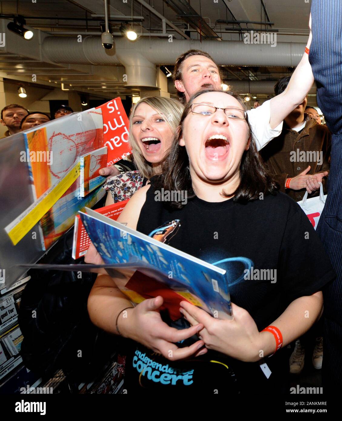 Paul McCartney signing copies of his Album Electric Arguments at the ...