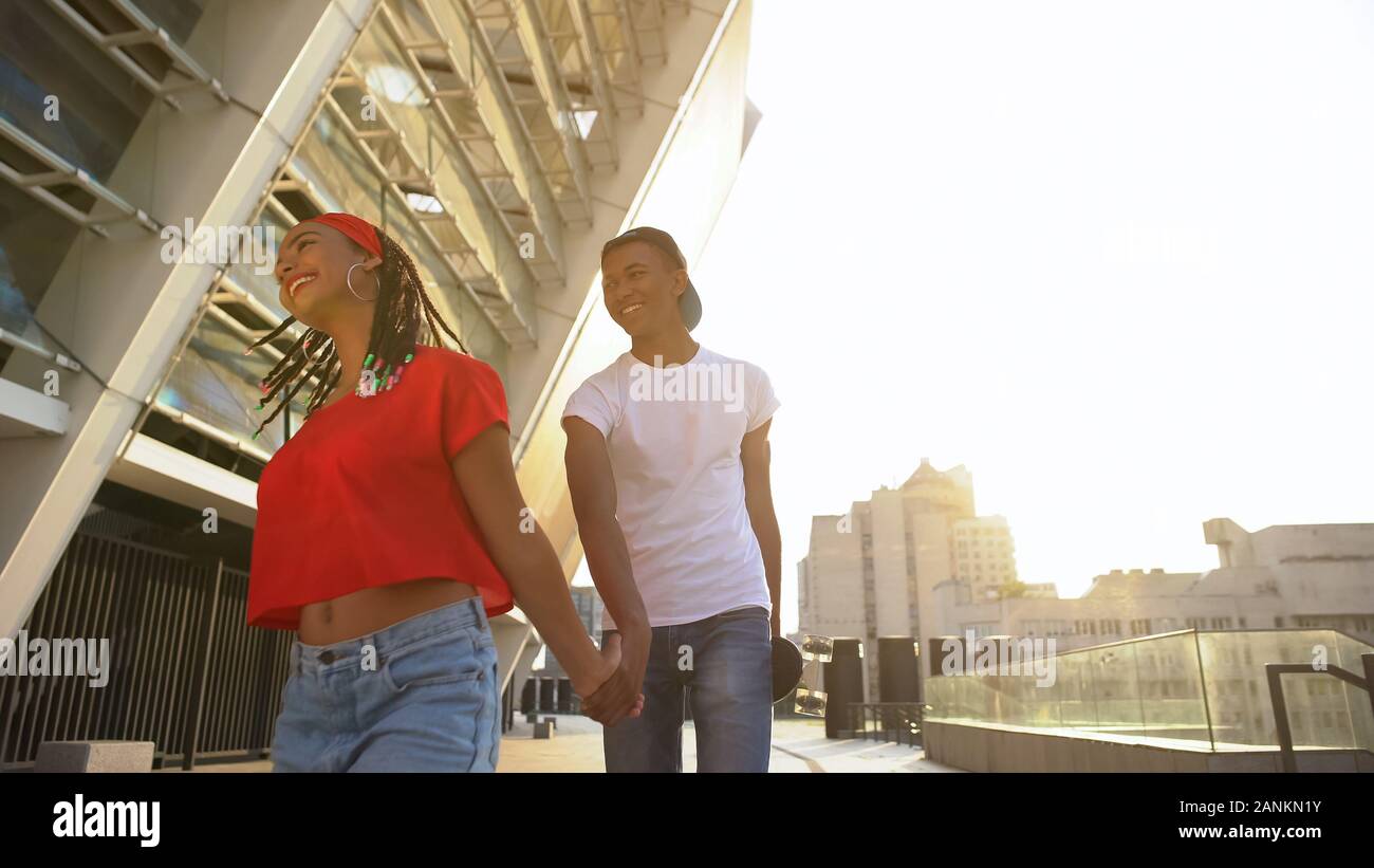 African teen couple walk hi-res stock photography and images - Alamy