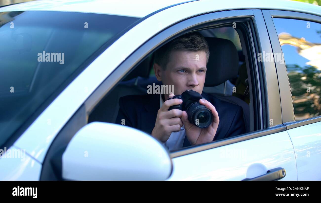 Paparazzi doing photo of celebrity from car, professional ...