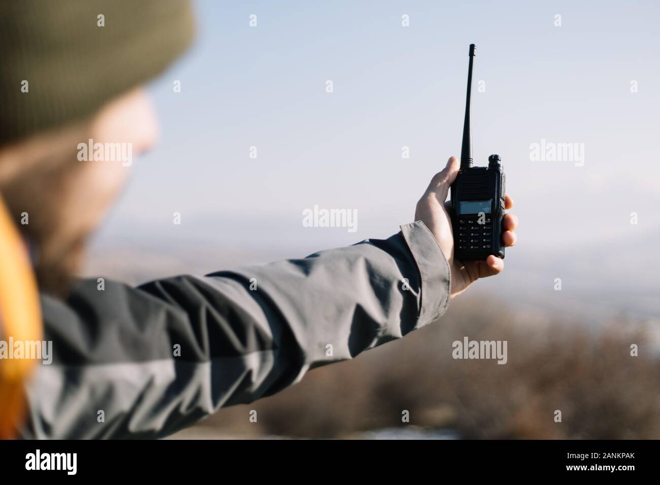 Hand holding walkie talkie radio hi-res stock photography and images ...