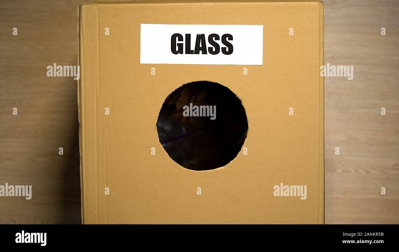 Cardboard box for glass, waste separation to reduce nature pollution ...